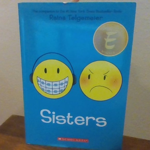 Scholastic | Other | Sisters Book Writen By Raina Telgemeier | Poshmark